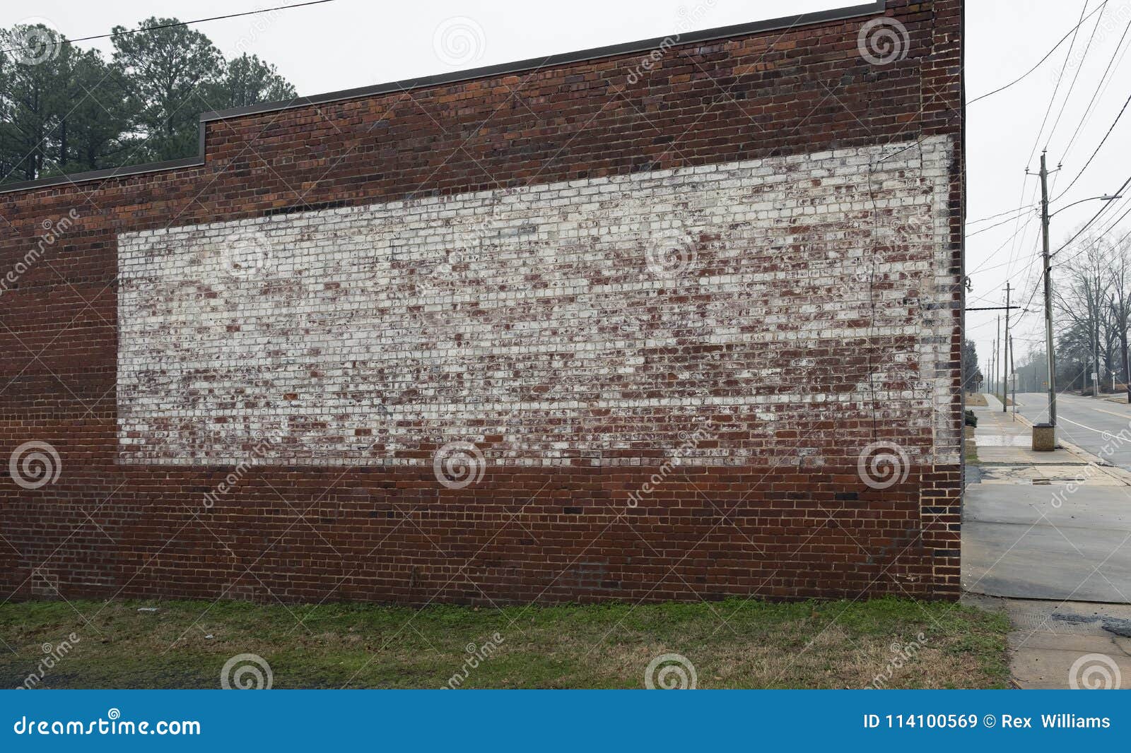 Faded Painted Sign on Rustic Old Brick Wall Texture Store or Building ...