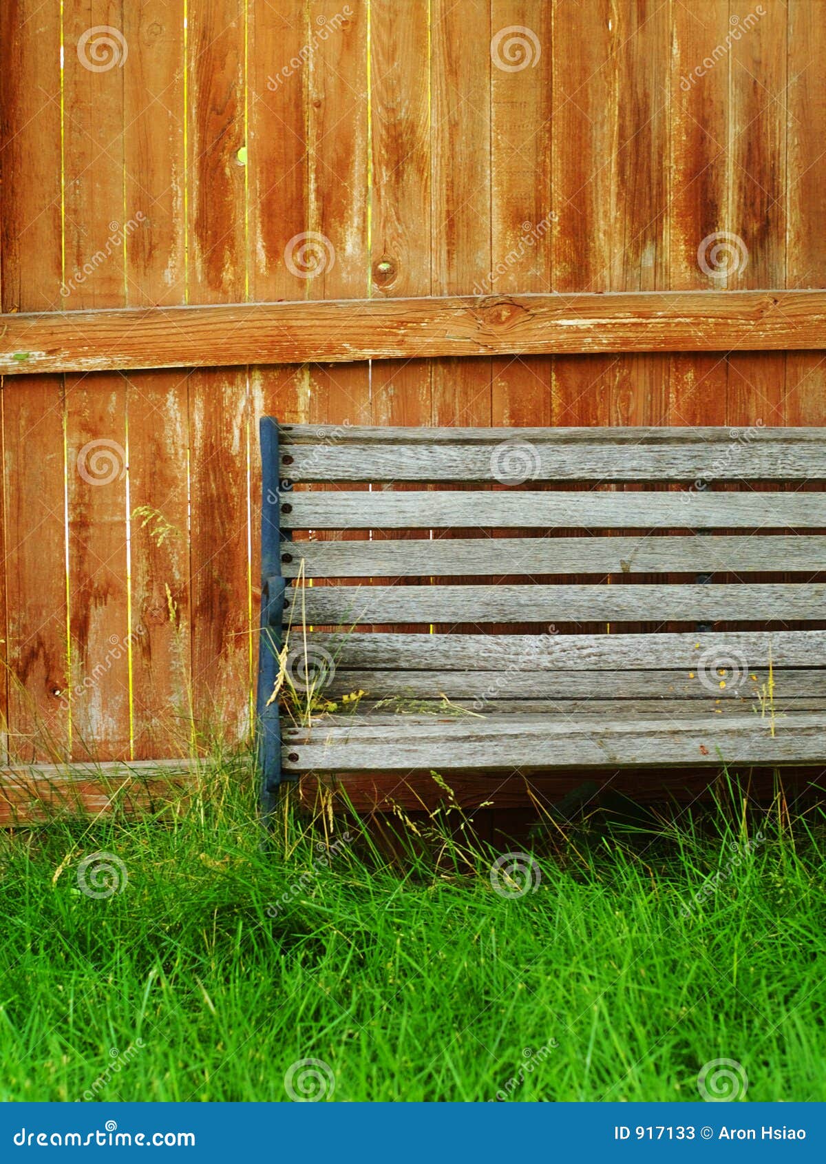 Faded Wooden Bench, Fence, and Grass Stock Image - Image of seating ...