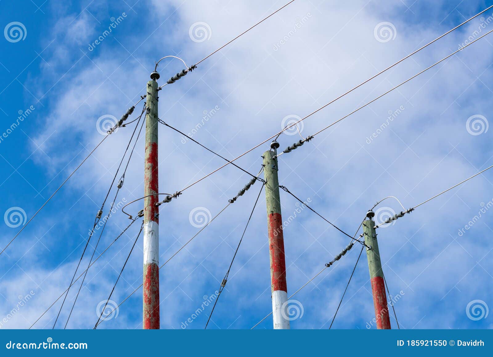 Fading Red and White Paint on High Voltage Power Poles Stock Photo ...