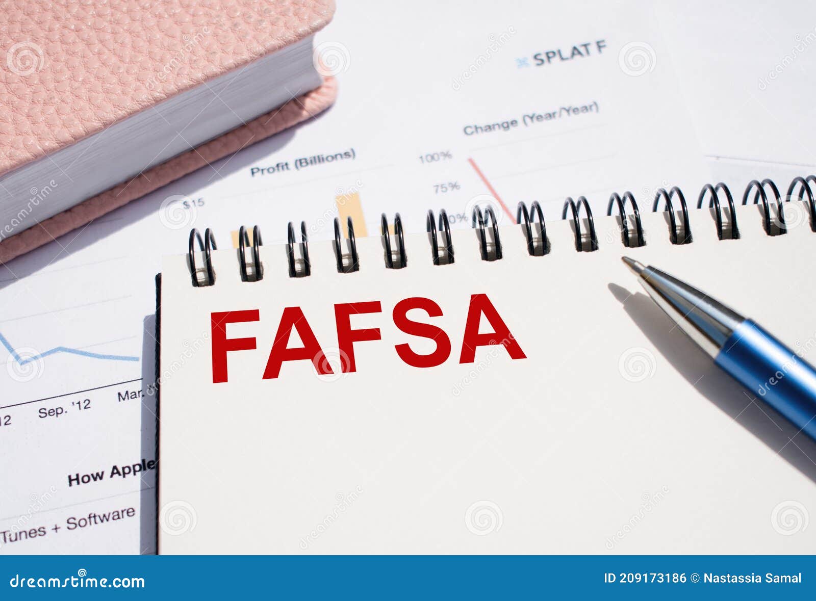 FAFSA Text Written on Notepad with Pen on Financial Documents Stock ...