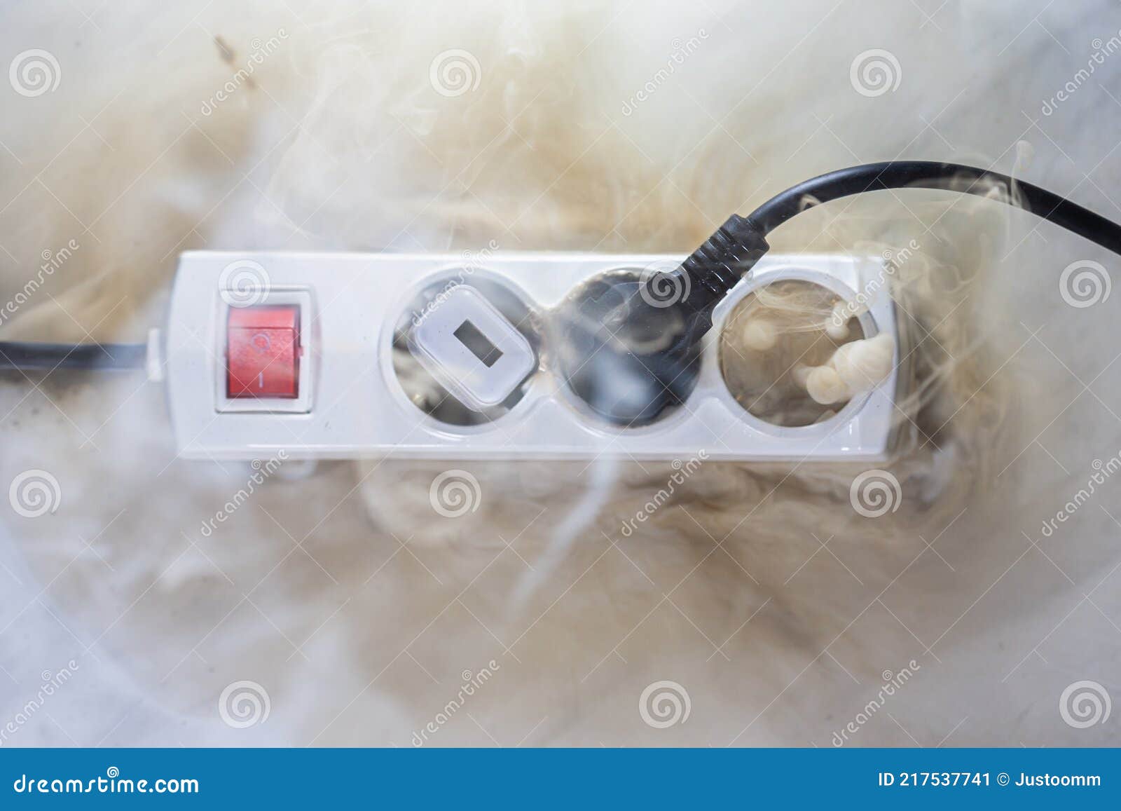 Burning of the Wire Cable and Socket Outlet Plug in the House, Blurred ...