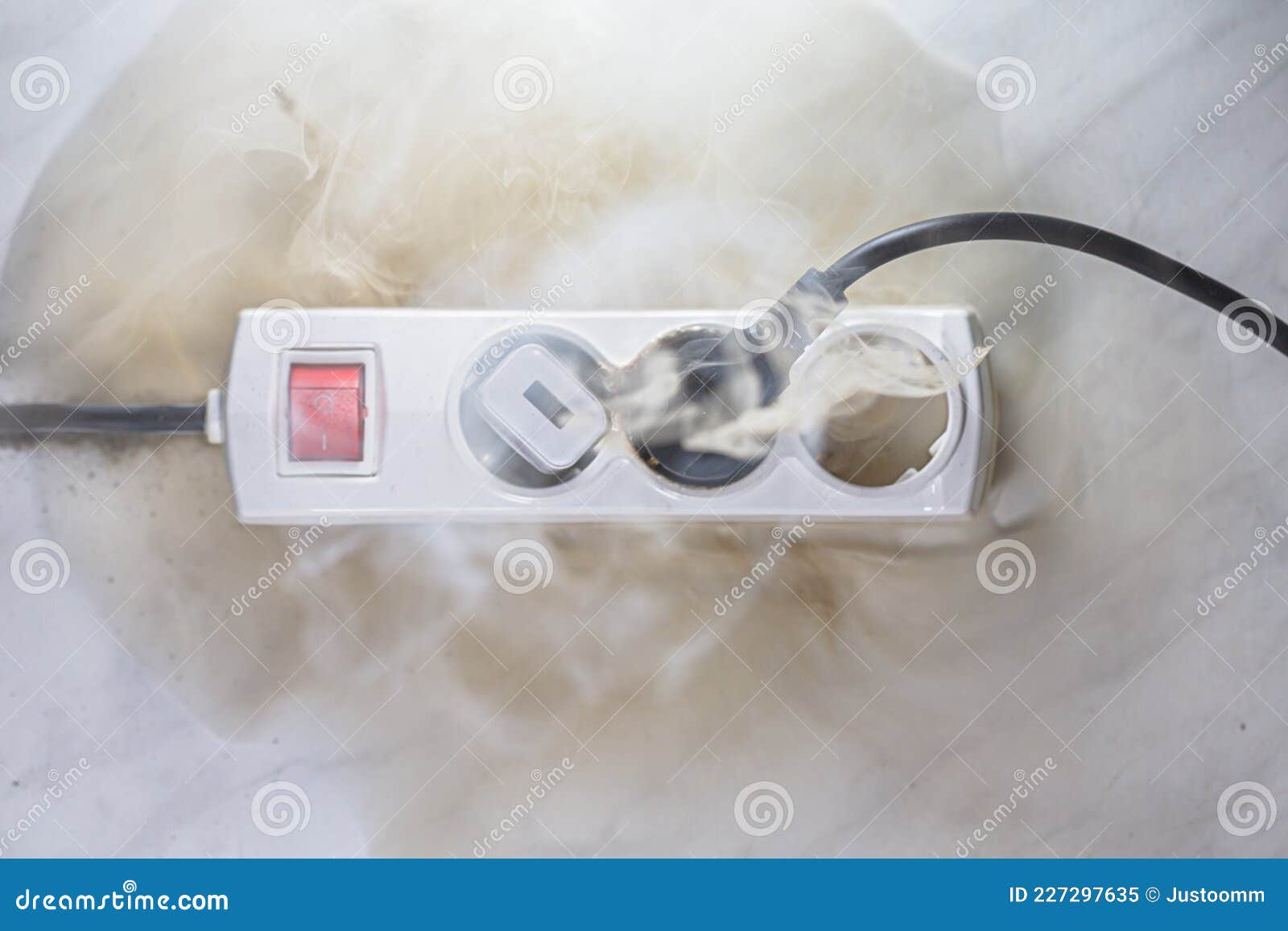 Burning of the Wire Cable and Socket Outlet Plug in the House, Blurred ...