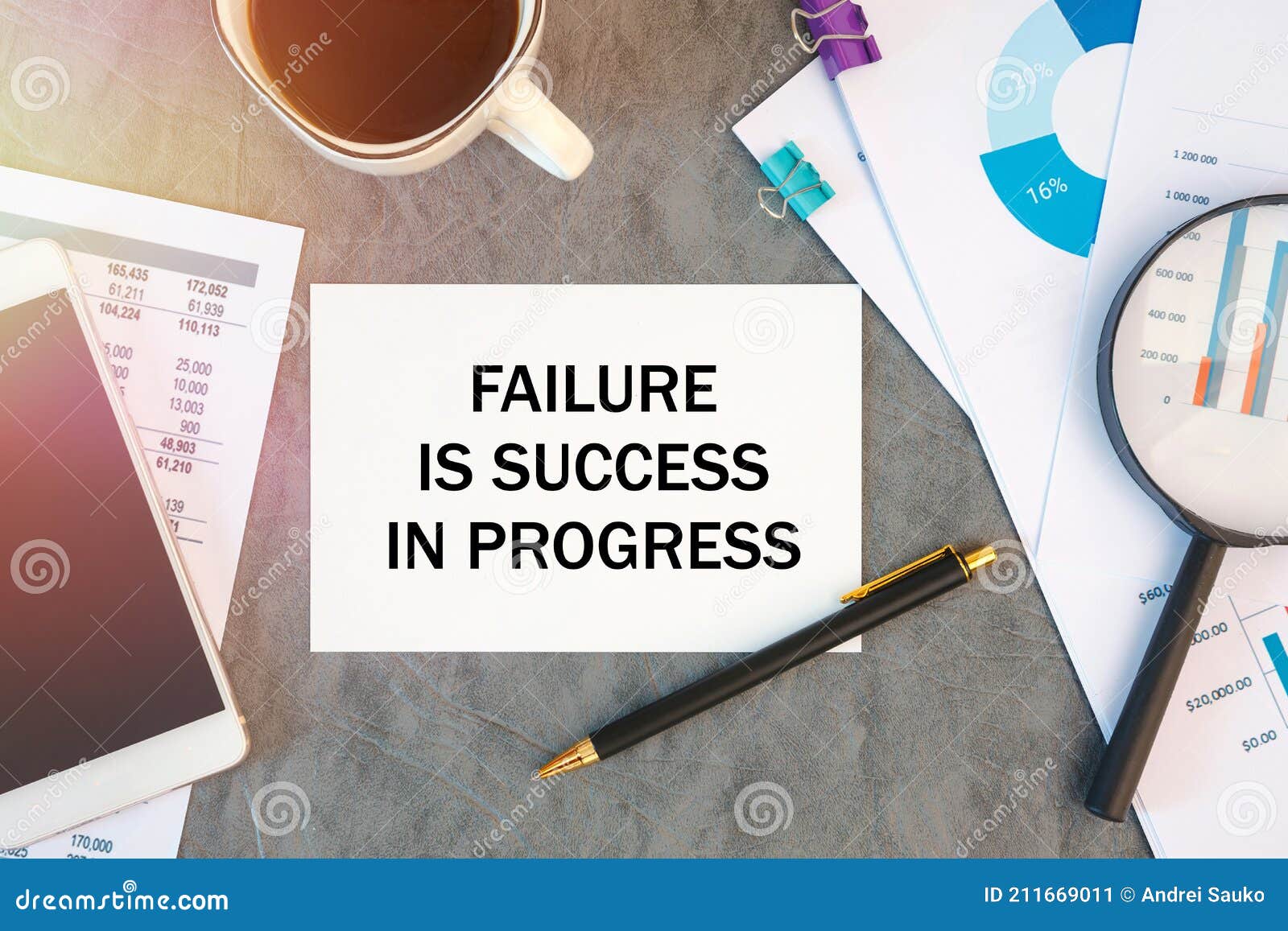 Failure is Success in Progress is Written in a Document on the Office ...