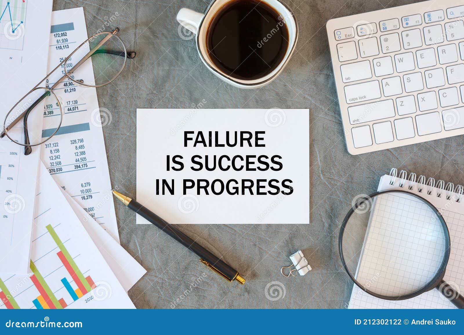 Failure is Success in Progress is Written in a Document on the Office ...