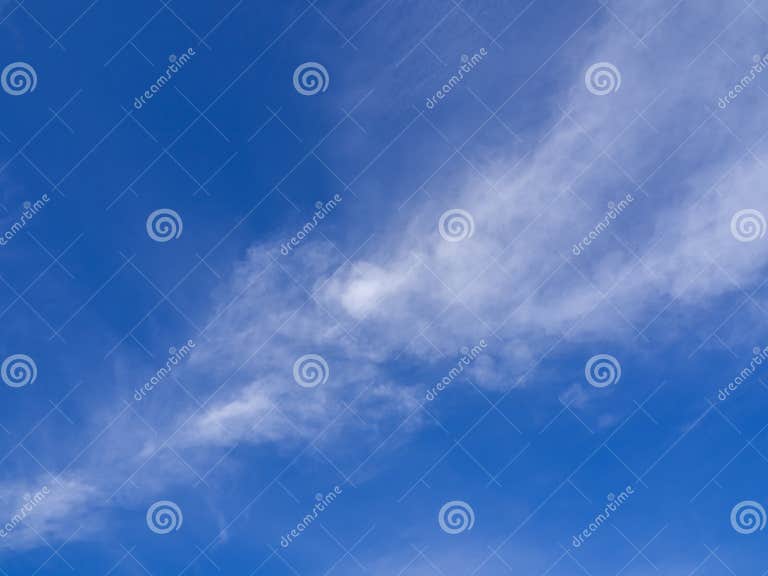 Faint Clouds Floating Scattered Across the Sky Stock Photo - Image of ...