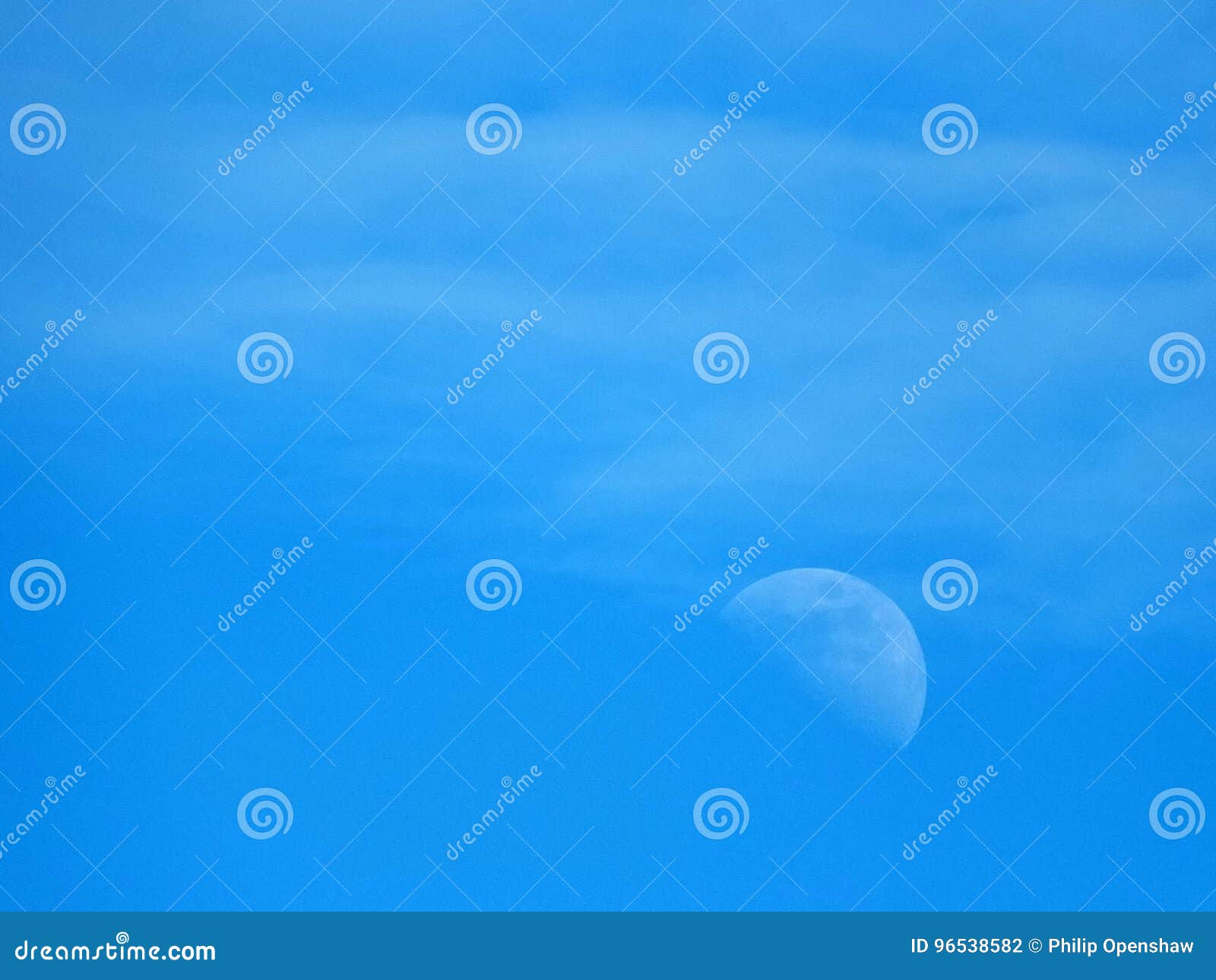 Faint Moon and Clouds in a Blue Sky Stock Photo - Image of high, blue ...