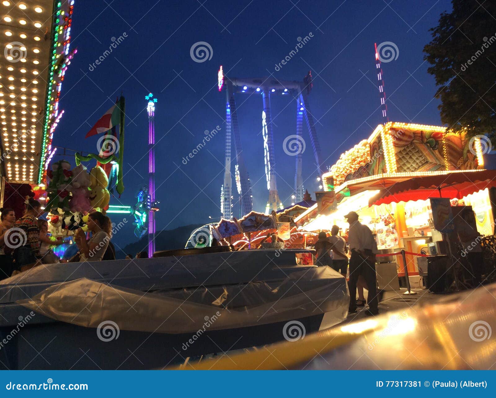 Fair in the Evening editorial photo. Image of rides, carousel - 77317381