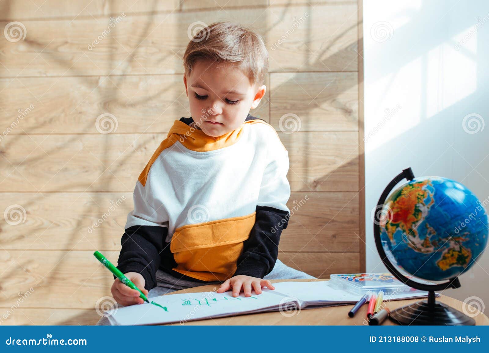 A Fair-haired Boy is Drawing Stock Photo - Image of childhood, innocent ...