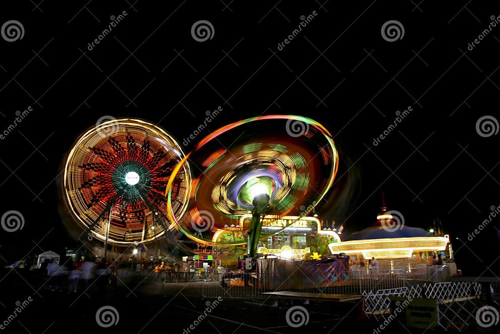 Fair Rides at Night stock image. Image of entertainment - 4837387
