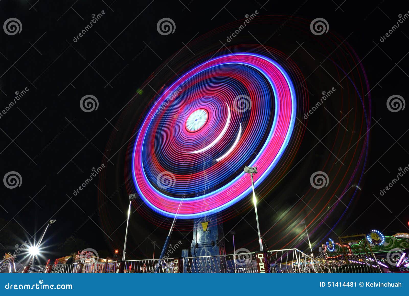 Fair rides at night stock image. Image of friends, carnival - 51414481