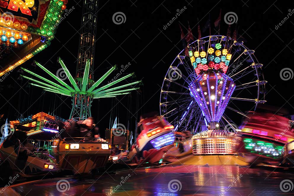 Fair with spinning rides stock image. Image of fair, celebration - 21414451