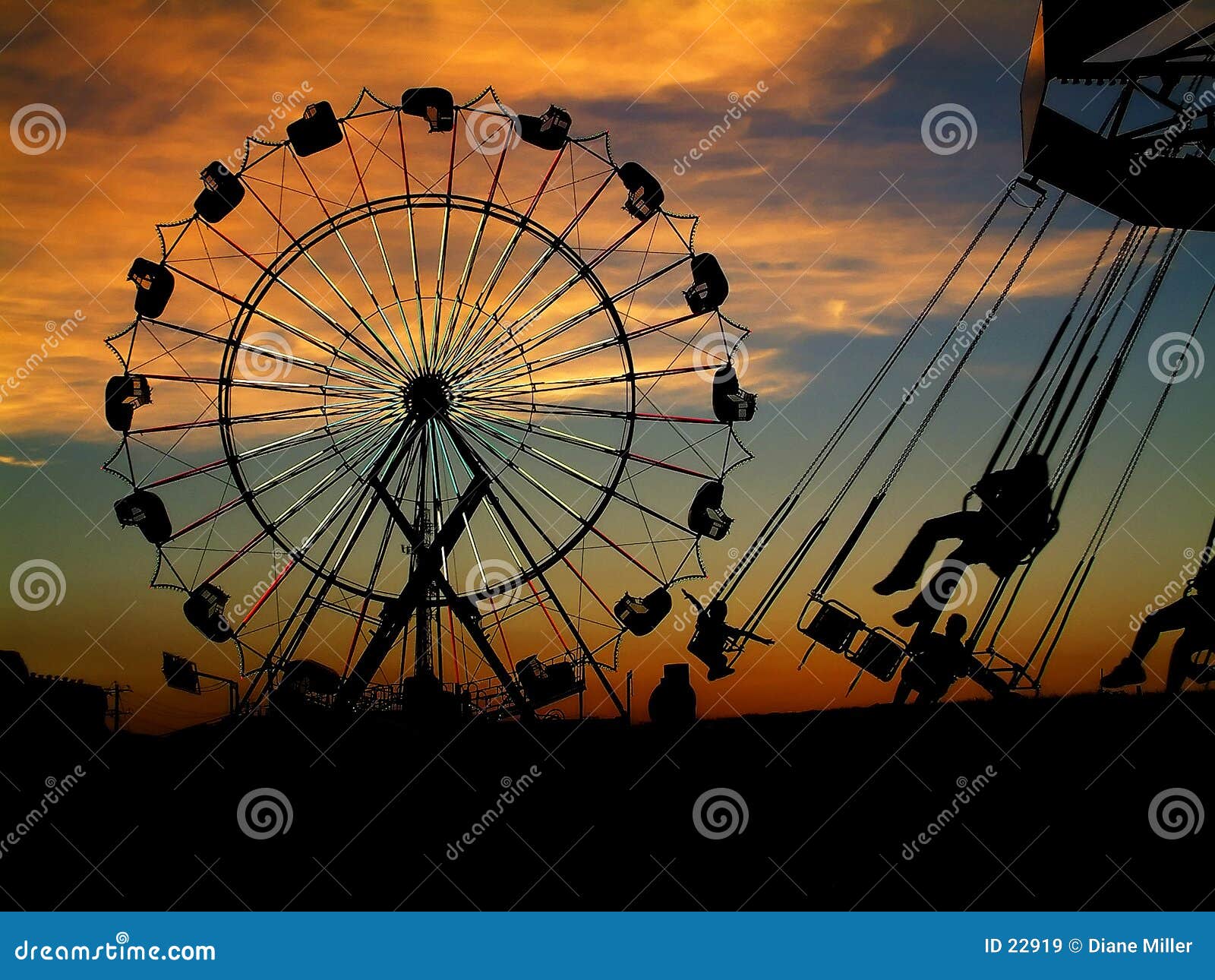 Fair at sunset stock image. Image of summer, rides, fair - 22919