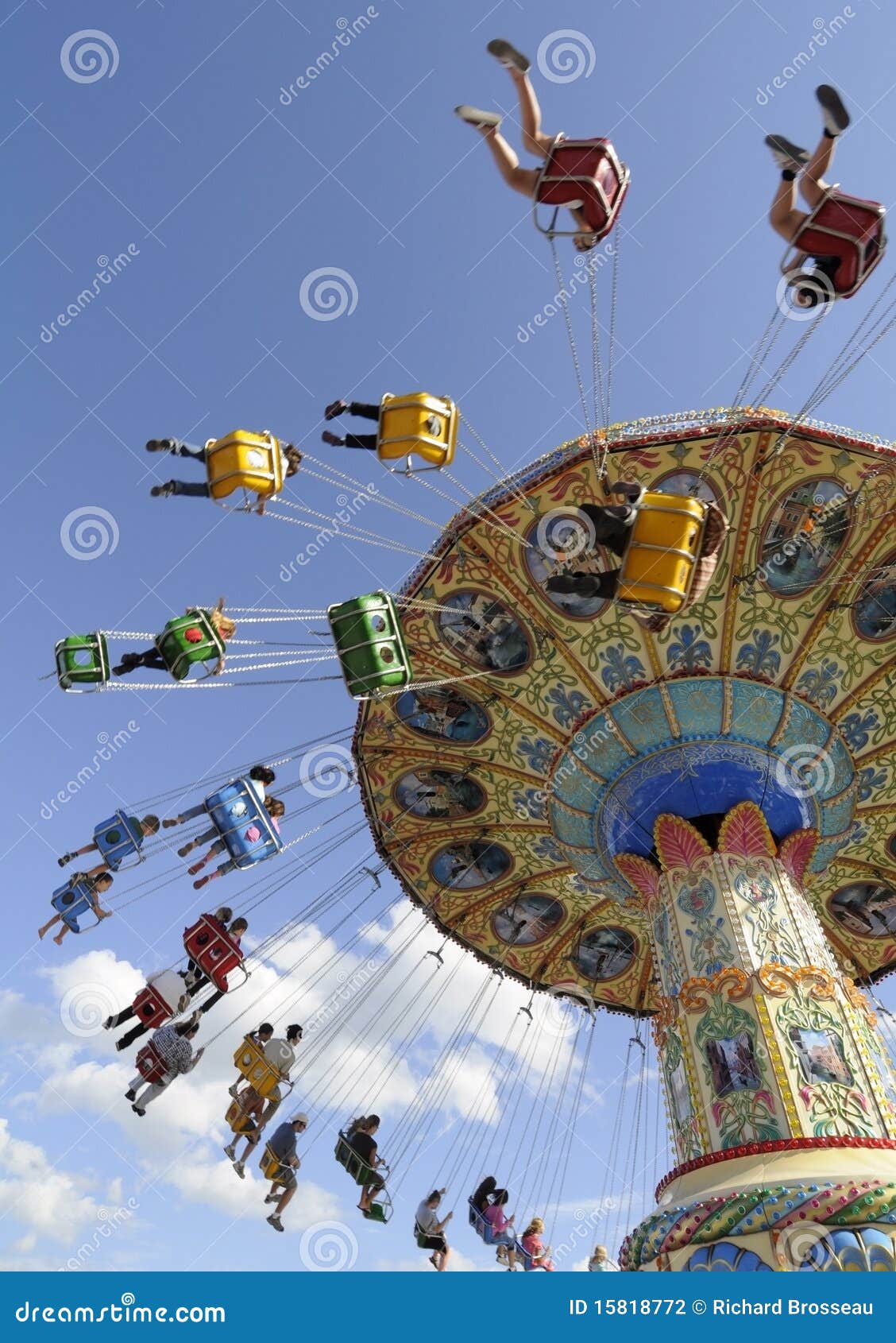Fairground Carousel Spinning Round Stock Photo - Image of text, blue ...
