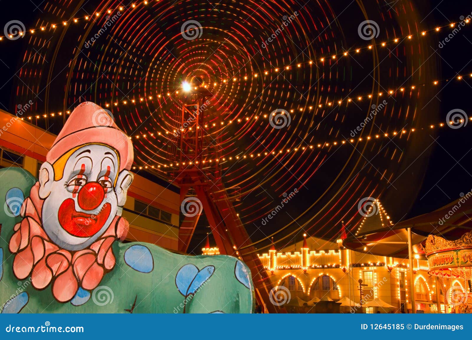 Fairground at night stock image. Image of lights, clown - 12645185