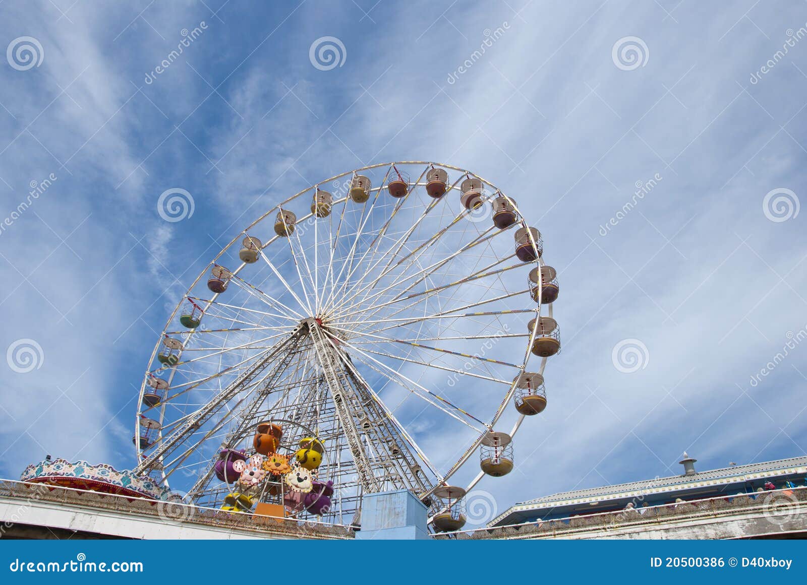 Fairground Wheel and Pier8 stock photo. Image of activity - 20500386