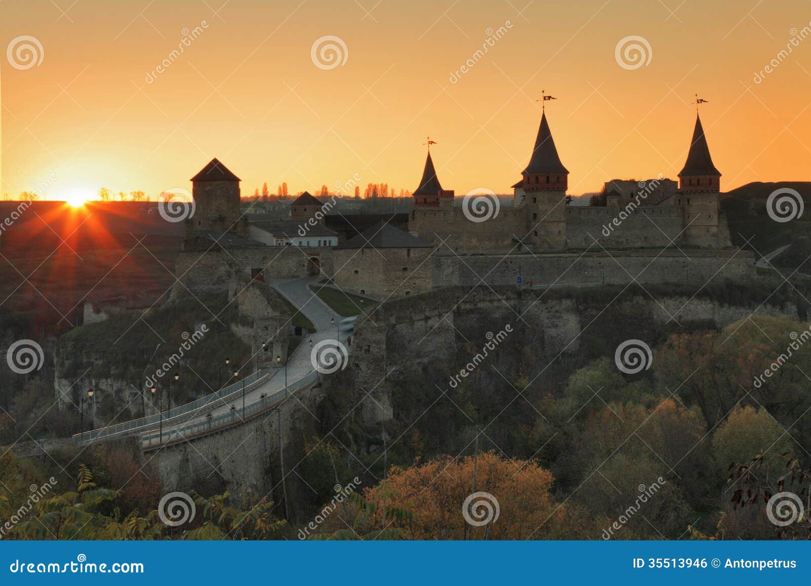 Fairytale castle at sunset stock photo. Image of road - 35513946