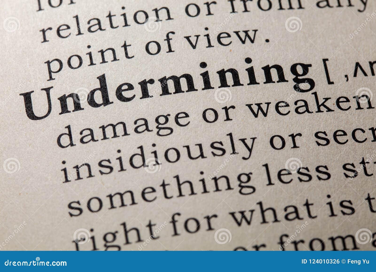 Definition of undermining stock photo. Image of undermining - 124010326