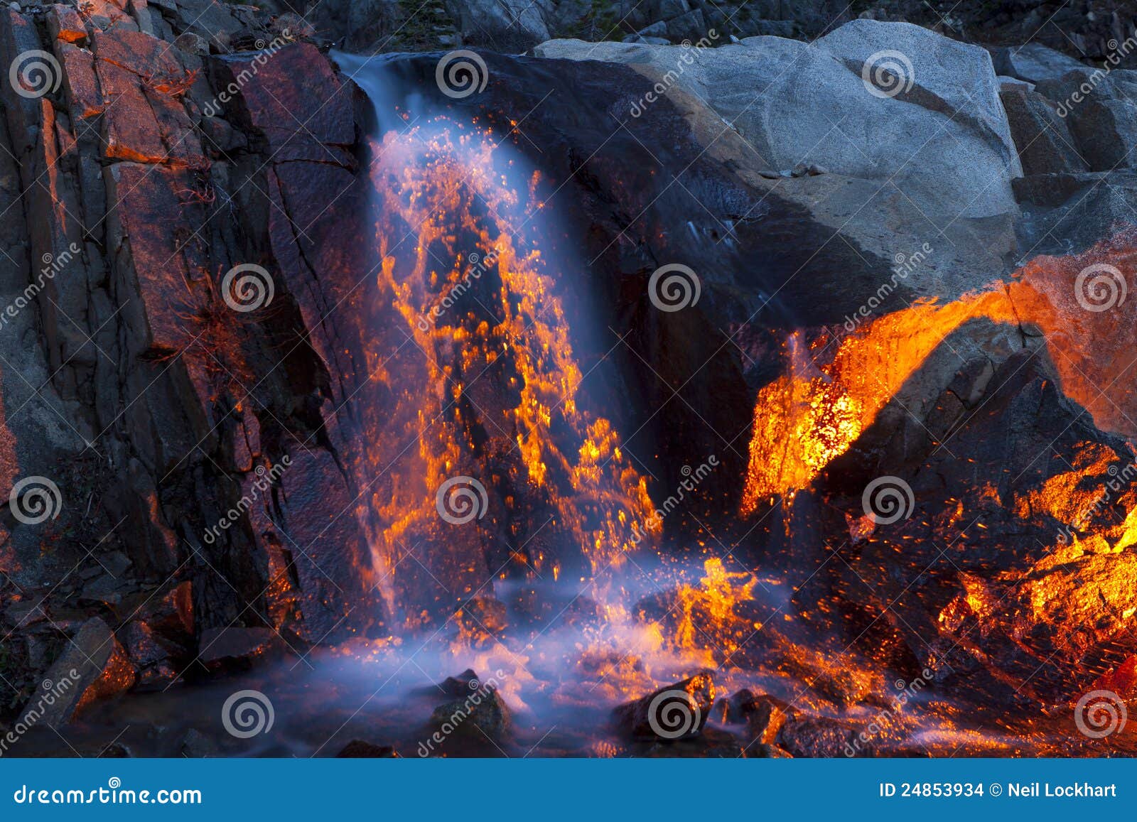 Fake Lava Waterfall and Rocks Stock Photo - Image of fiery, orange ...