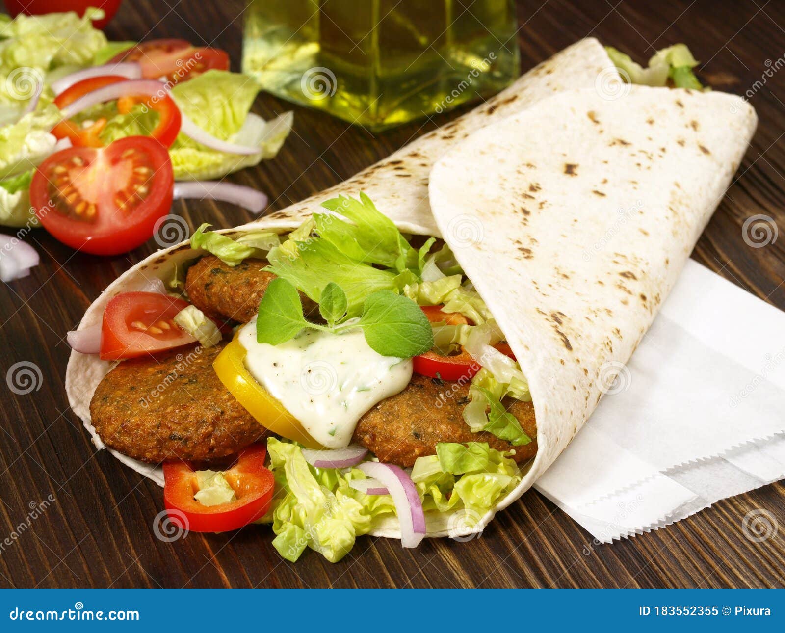 Falafel Wrap - Fast Food stock image. Image of dinner - 183552355