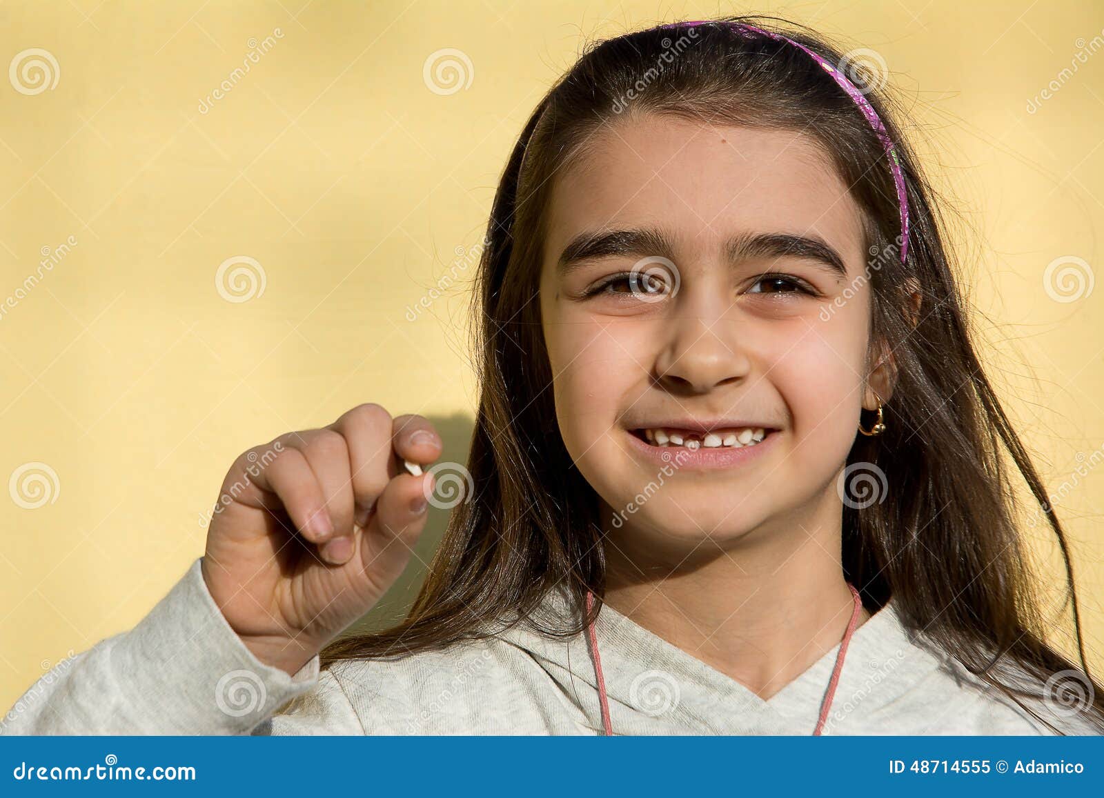 The fall of the baby tooth stock image. Image of care - 48714555