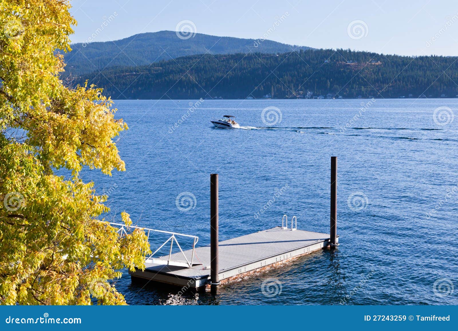 Fall Boating on Blue Lake stock image. Image of color - 27243259