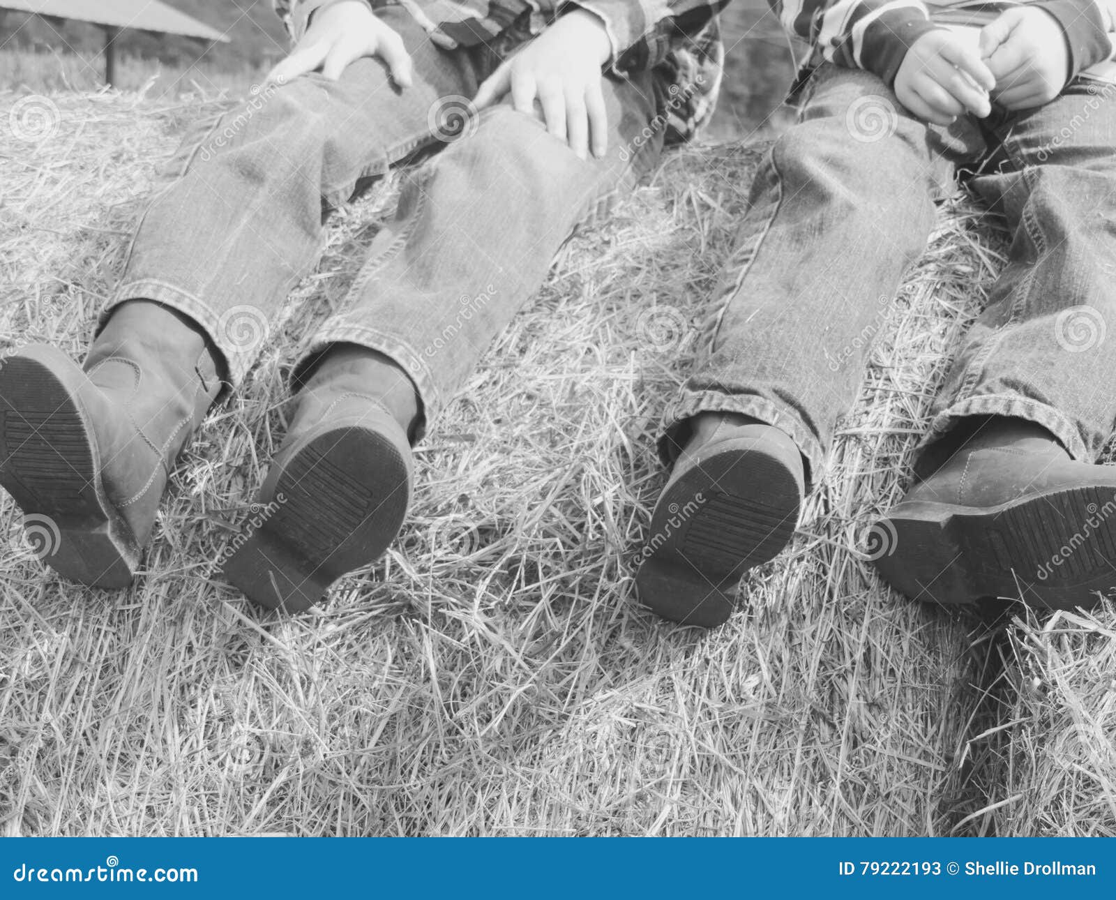 Fall Boots on Top of Hay Bail Stock Image - Image of sitting, boots ...