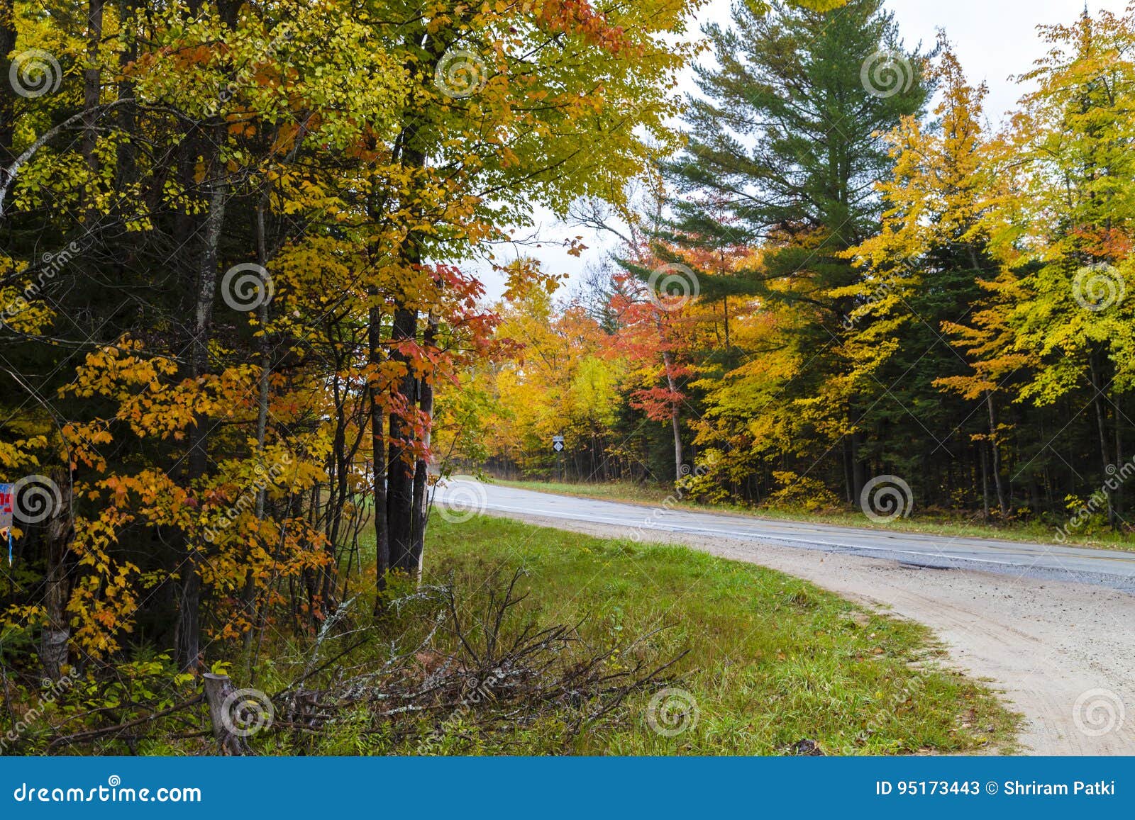 Fall Colors on a Road in Michigan Stock Image - Image of clouds ...