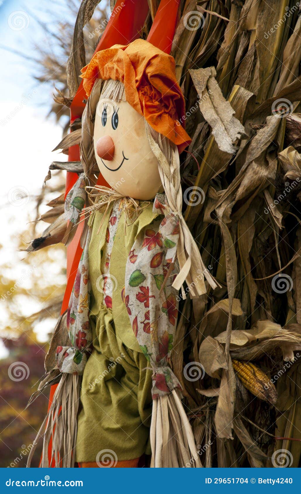 Fall Decorations with Scarecrow and Hay Stack. Stock Photo - Image of ...