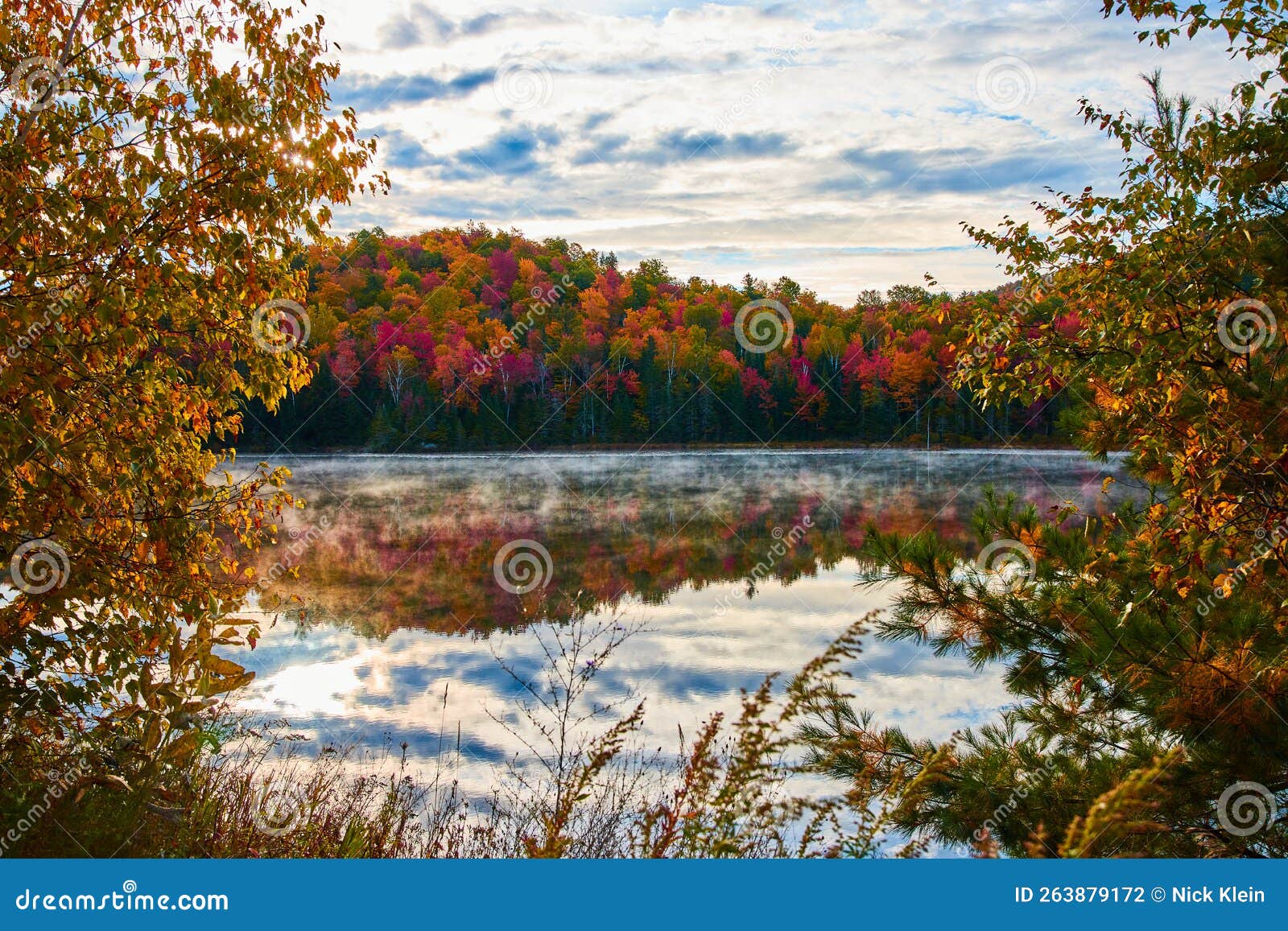 Fall Forest Surrounds Lake with Foggy Surface Stock Photo - Image of ...