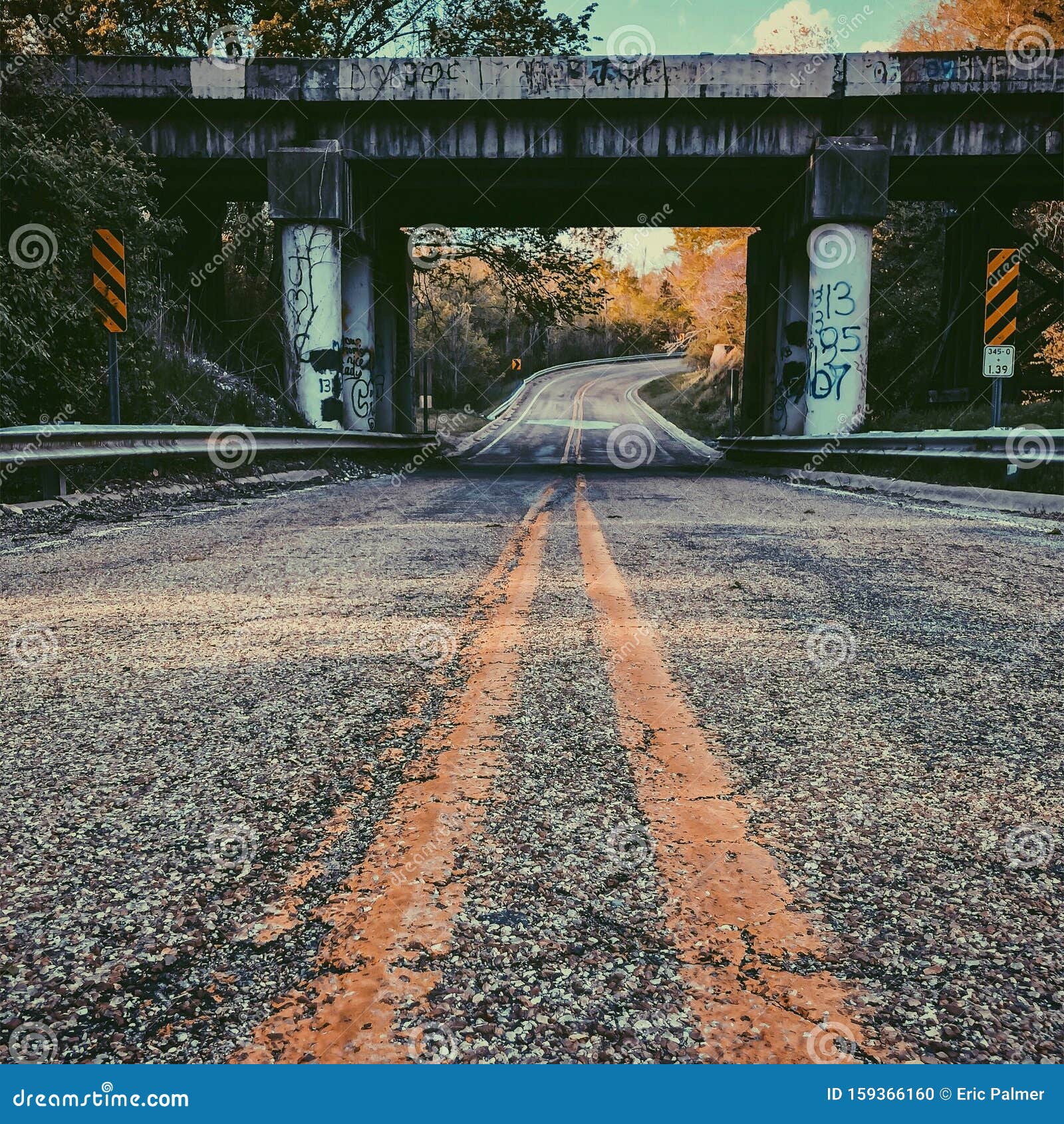 Fall Pic of a Rural Road and Bridge Stock Photo - Image of clouds, fall ...