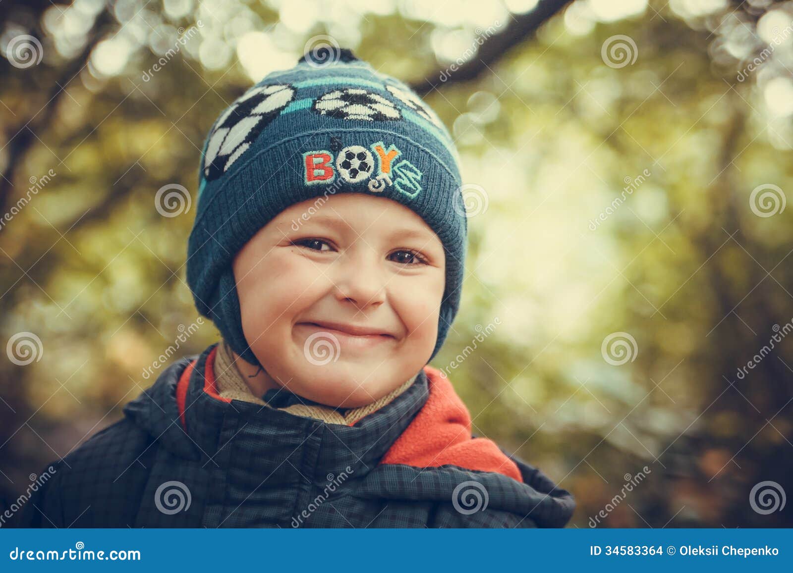 Fall Portrait of a Smiling Boy Stock Photo - Image of leaf, male: 34583364