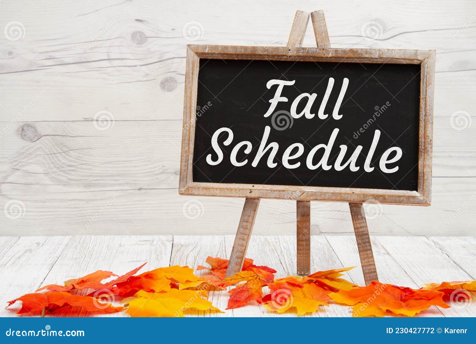 Fall Schedule Sign on Standing Chalkboard on Wood with Fall Leaves ...