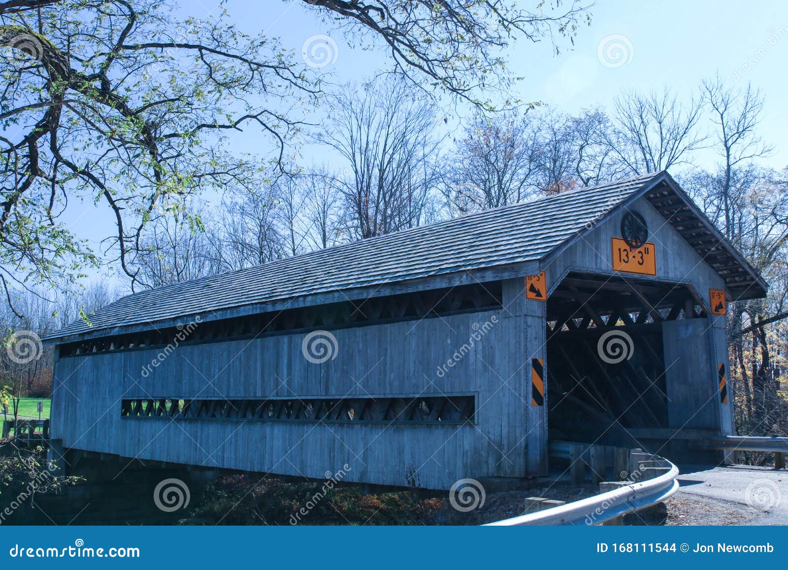 Fall View of Covered Bridges Over a River. Stock Photo - Image of river ...