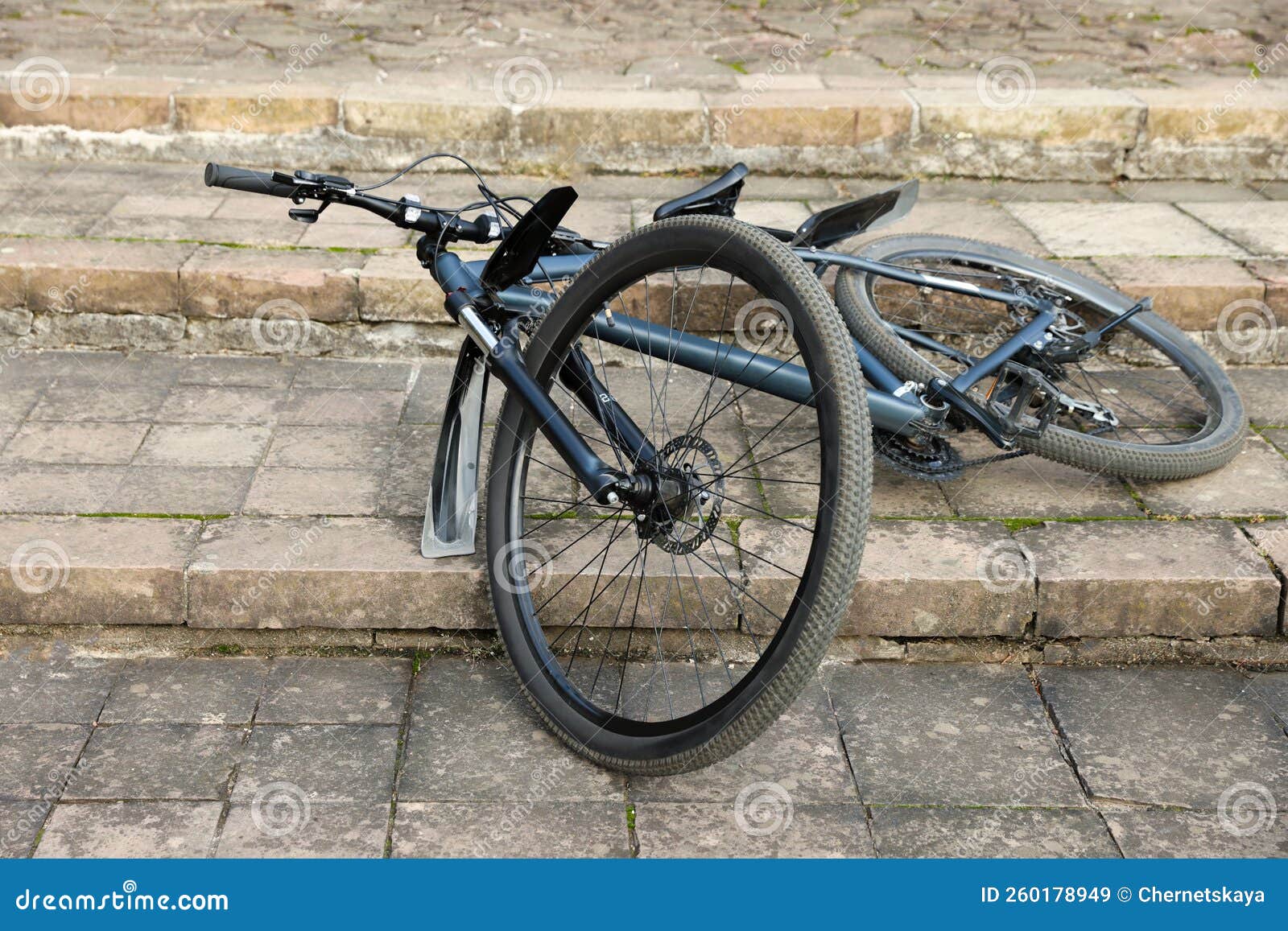 Fallen Beautiful Modern Bicycle on Steps Outdoors Stock Image - Image ...