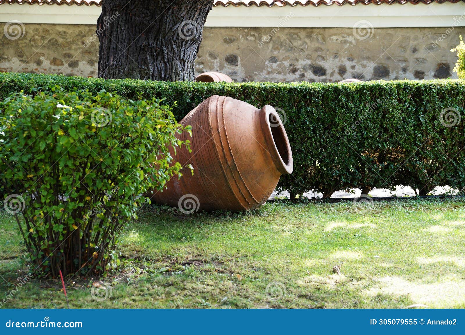 Fallen Clay Jug As an Element of Landscape Design in the Garden Stock ...