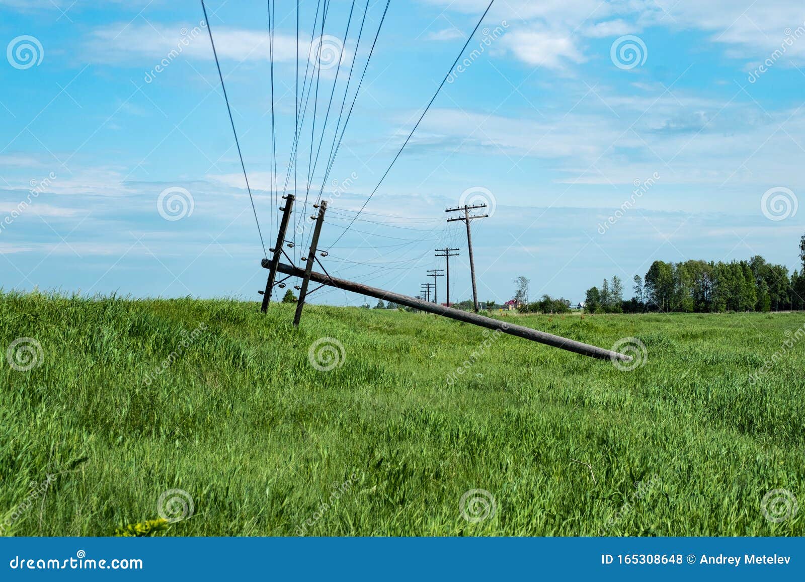 Fallen on the Field Pole with Electricity Stock Photo - Image of line ...