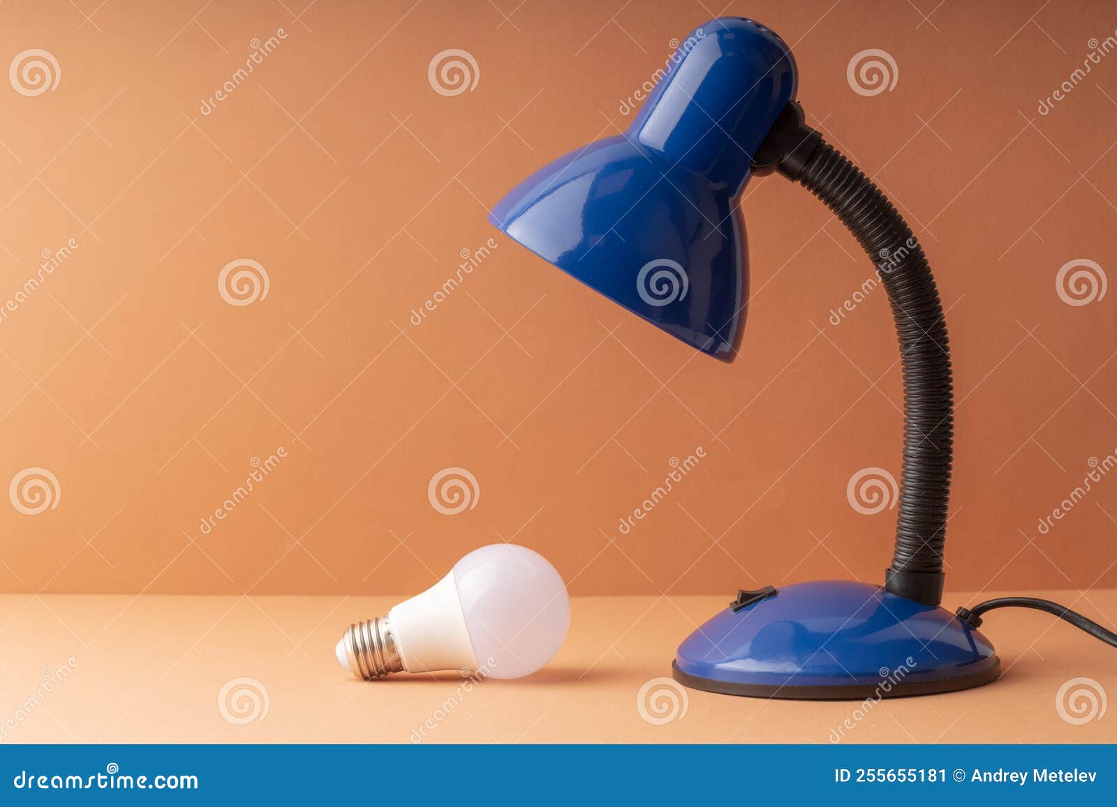 A Fallen Light Bulb from a Table Lamp, a Blue Light and an LED Lamp ...