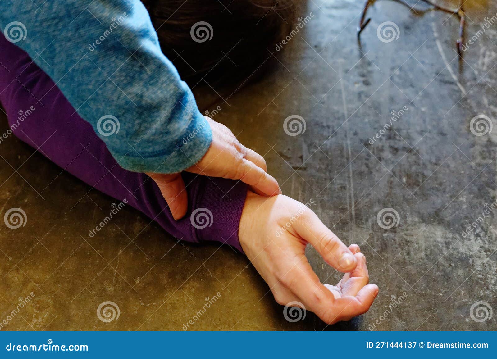 Fallen Person on Floor Having Pulse Checked Stock Image - Image of ...