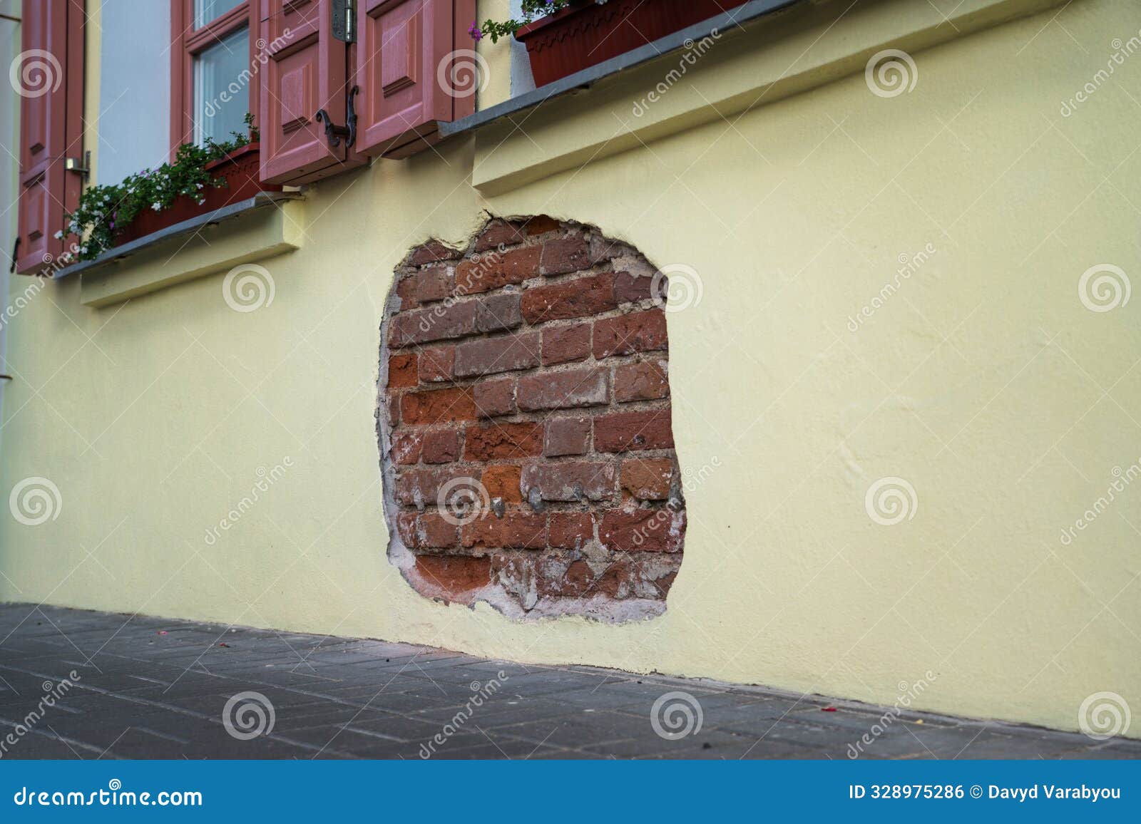 The Fallen Plaster from the Wall of the Building from Under Which the ...