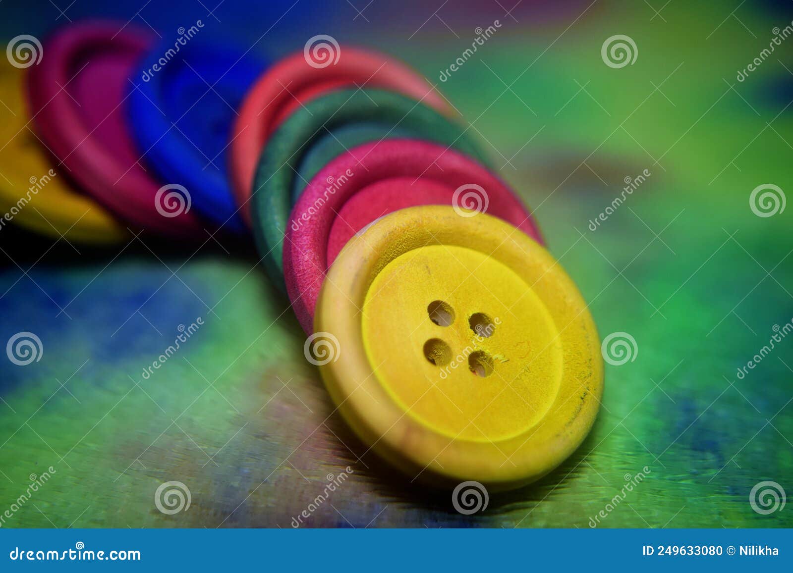 Fallen stacked buttons stock photo. Image of wallpaper - 249633080