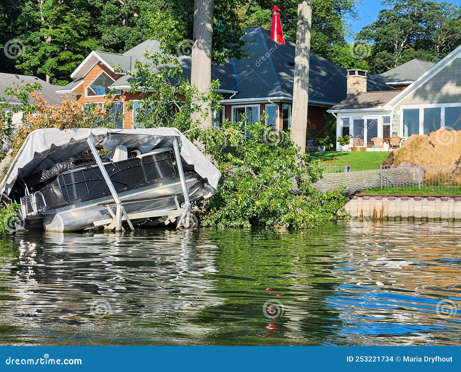 Fallen Tree Crushing Pontoon Boat Stock Photo - Image of recreation ...