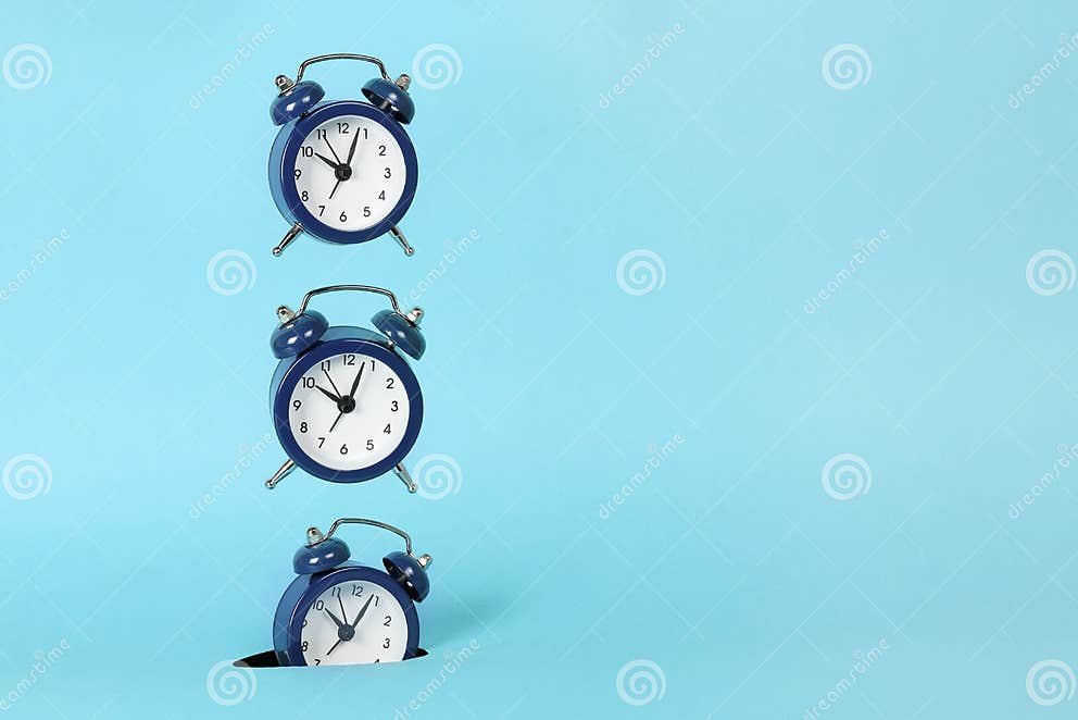 Falling alarm clock stock photo. Image of spend, falling - 161973296