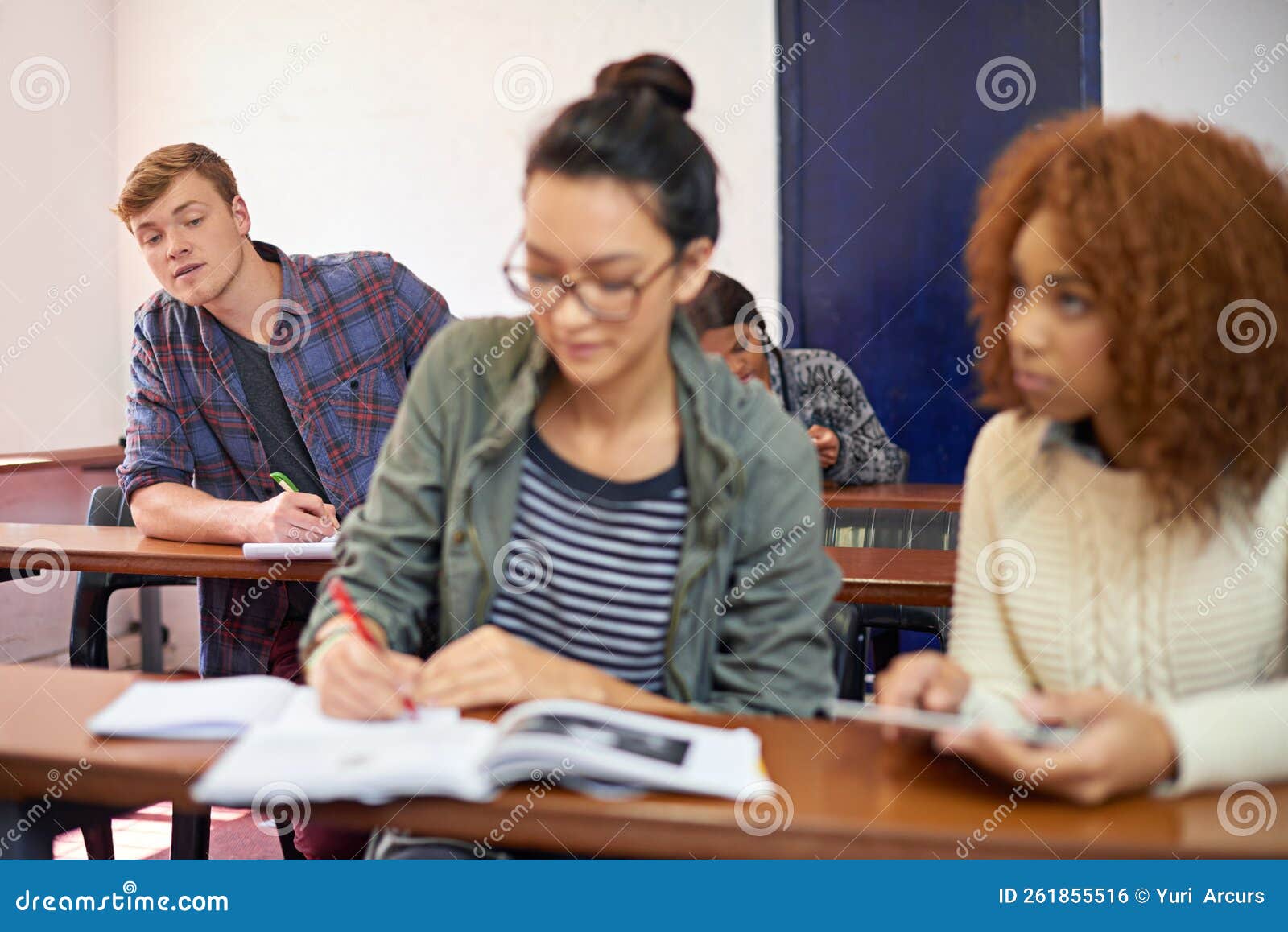 Falling Behind in Class. a Student Trying To See Another Students Work ...