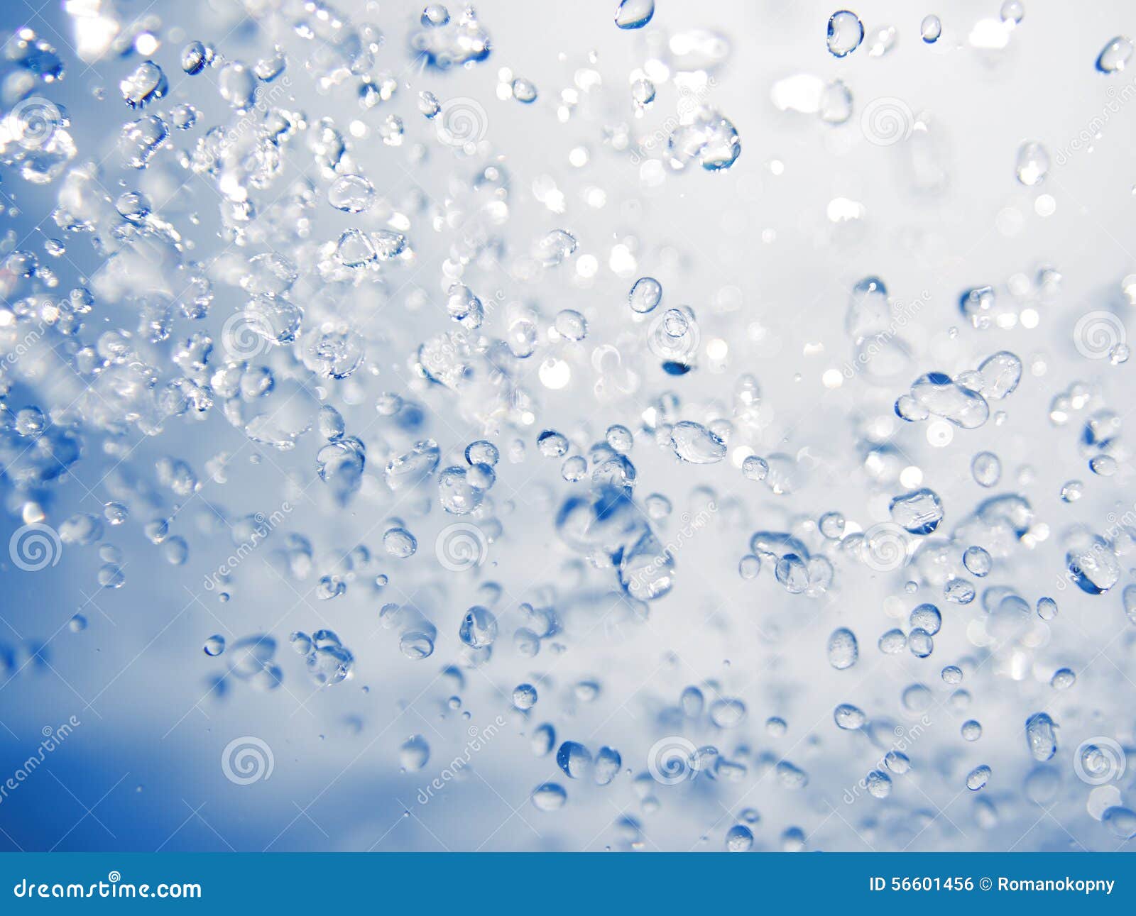 Falling blue waterdrops. stock photo. Image of raindrop - 56601456