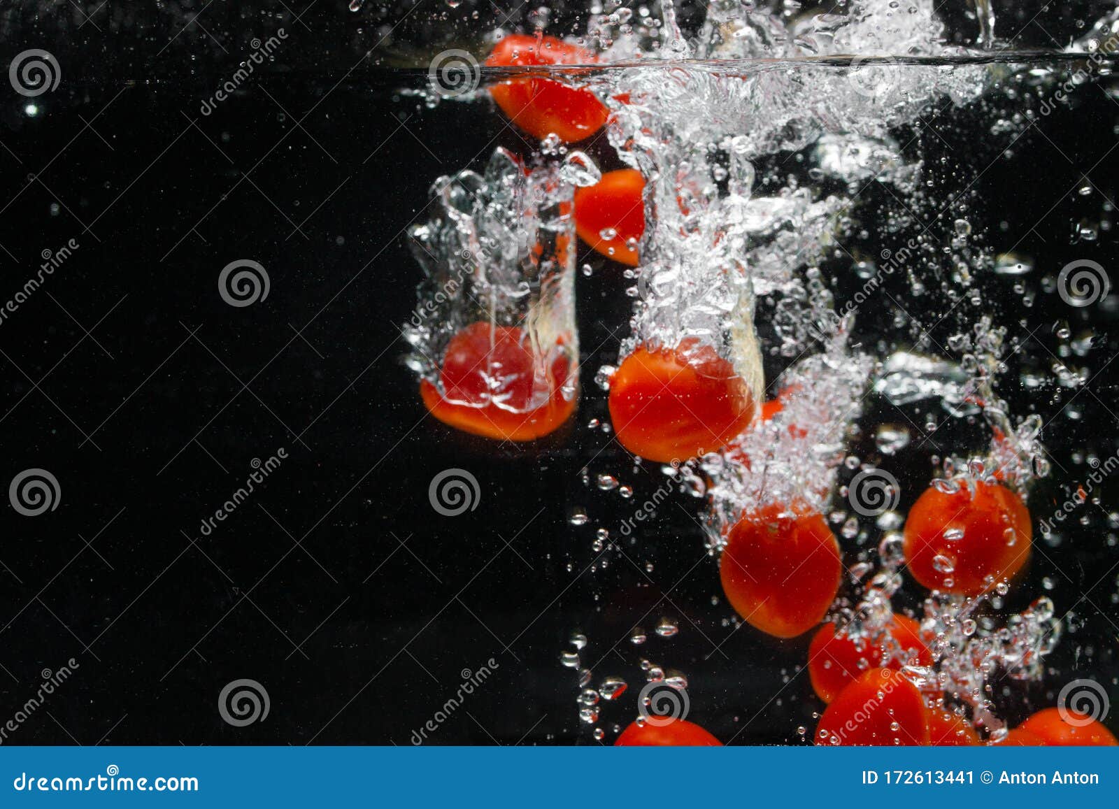 Falling Cherry Tomatoes into the Water, Spray for Design, Freezing in ...
