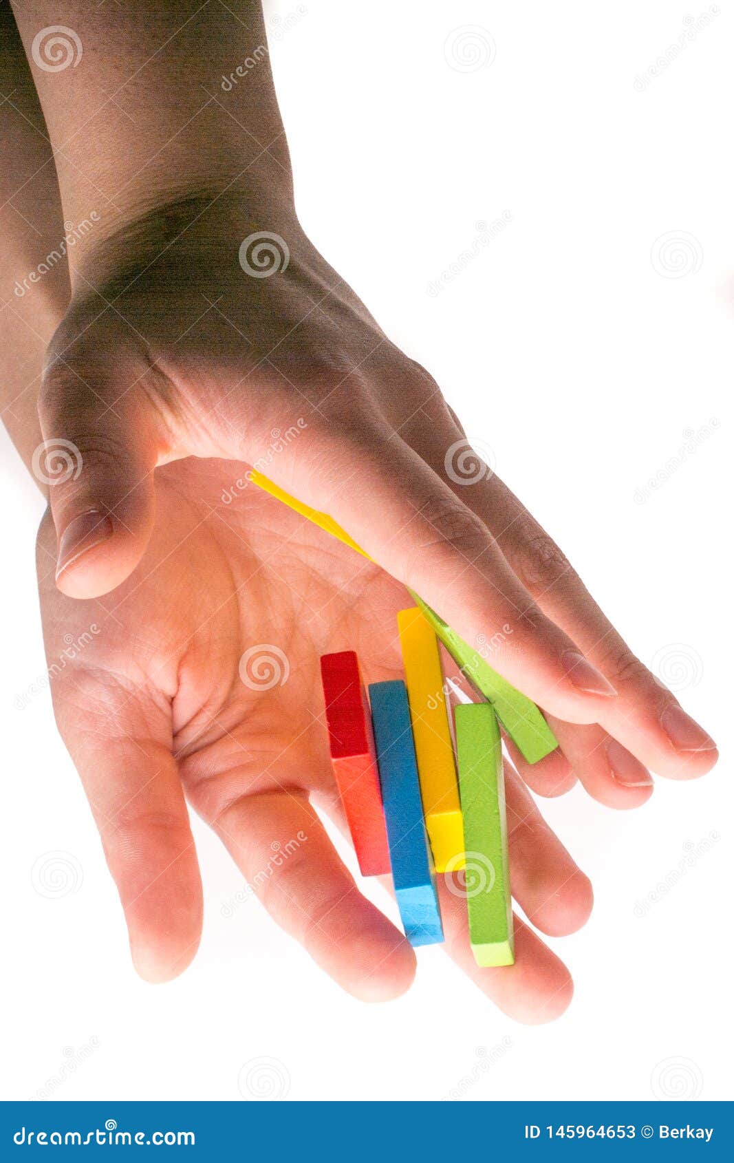 Falling Colorful Domino in Hand Stock Image - Image of concept ...
