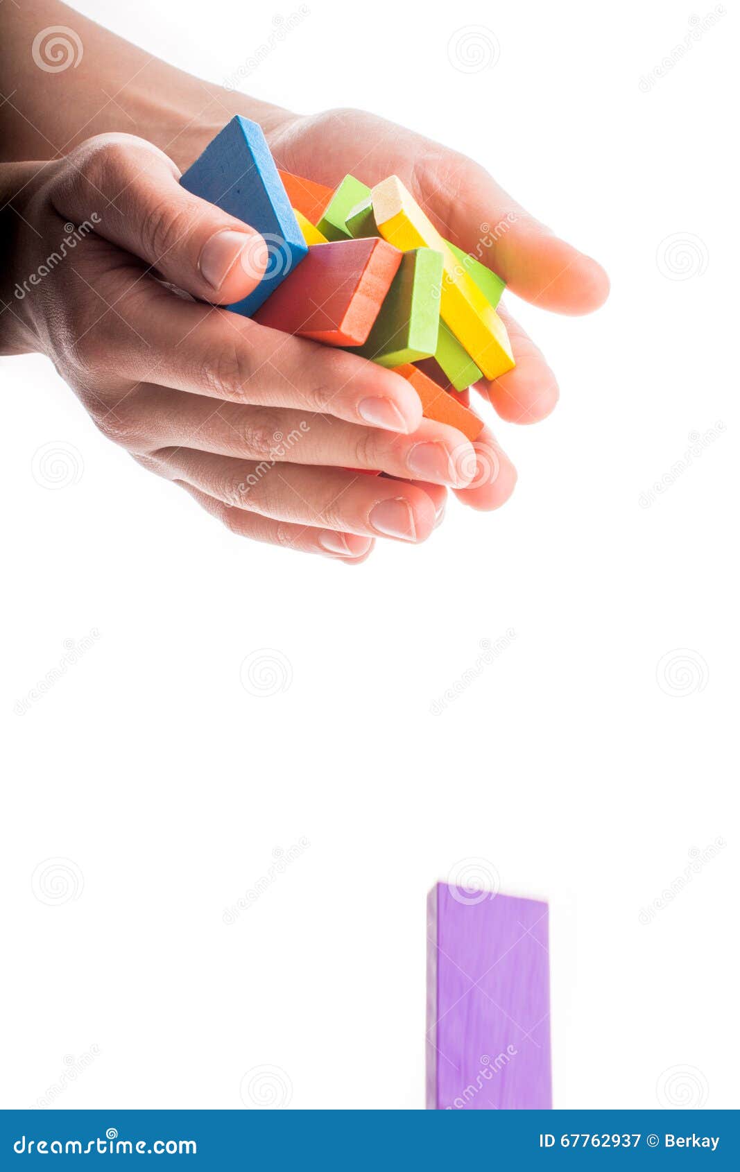 Falling Colorful Domino in Hand Stock Image - Image of design, idea ...