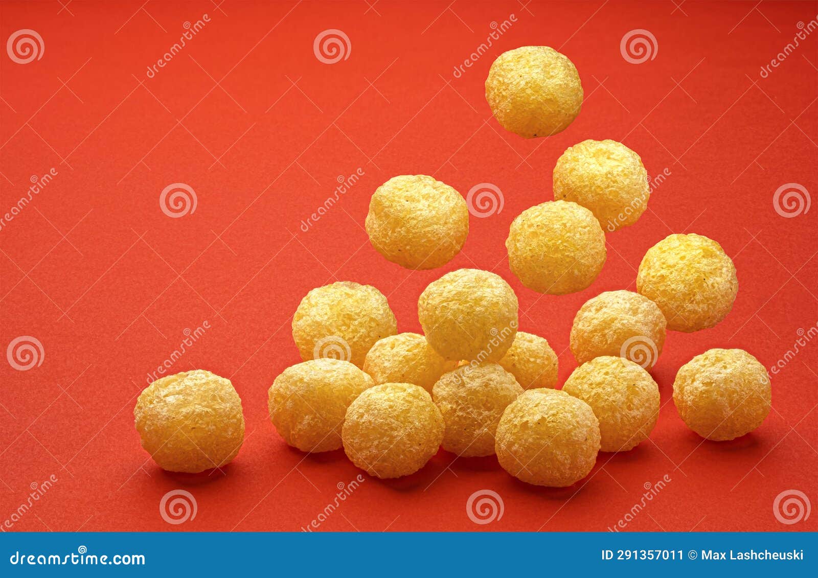 Falling Corn Balls Isolated on Red Background, Full Depth of Field ...