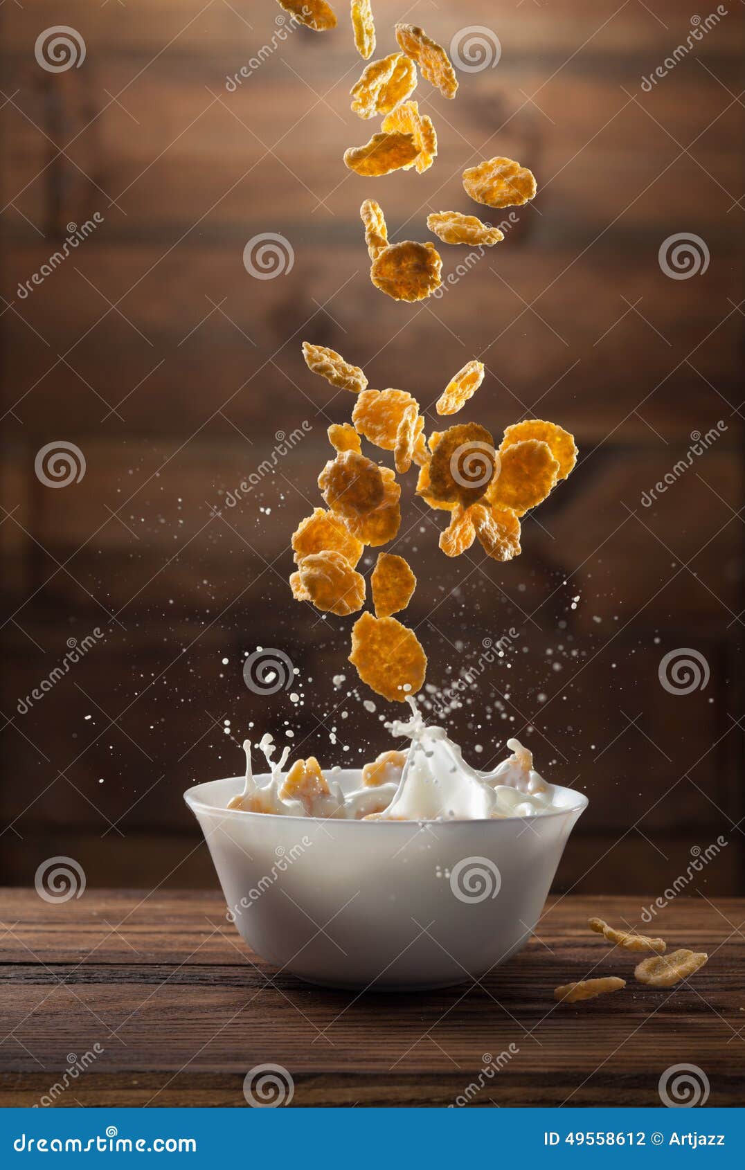 Falling Corn Flakes with Milk Splash on Wood Stock Photo - Image of ...