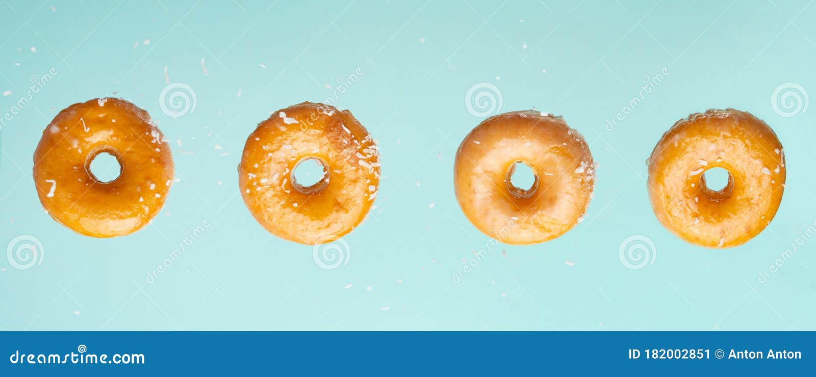 Falling Donuts in a Glaze on a Blue Background Stock Image - Image of ...